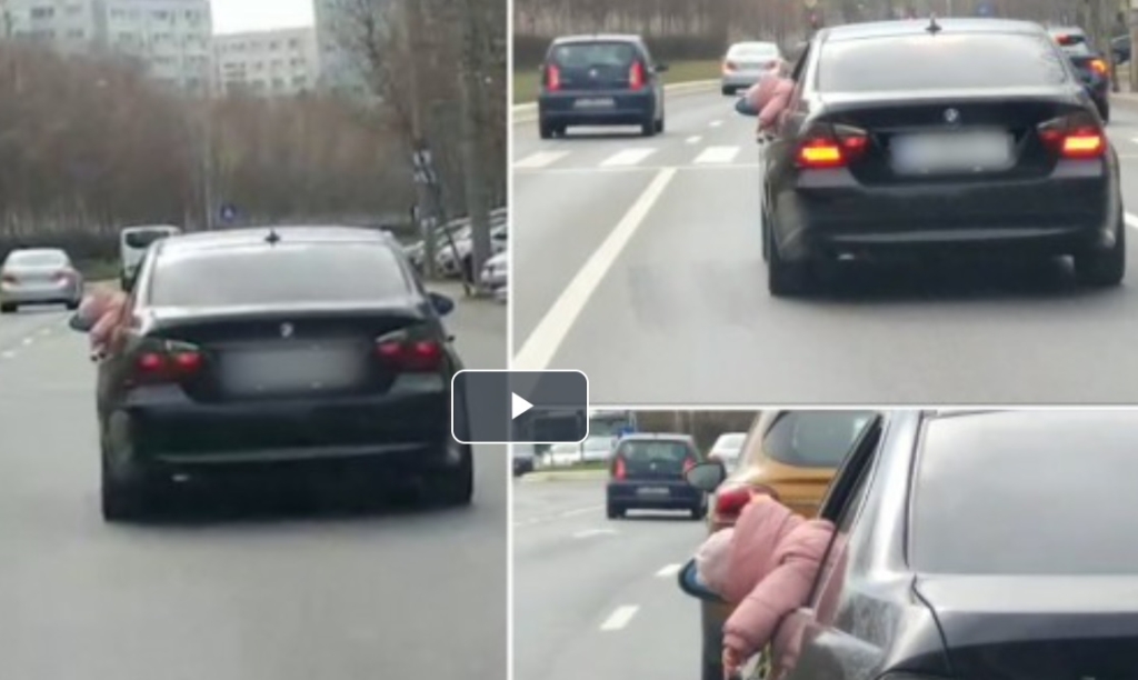 Imagini revoltătoare! Copil filmat atârnând pe geamul deschis